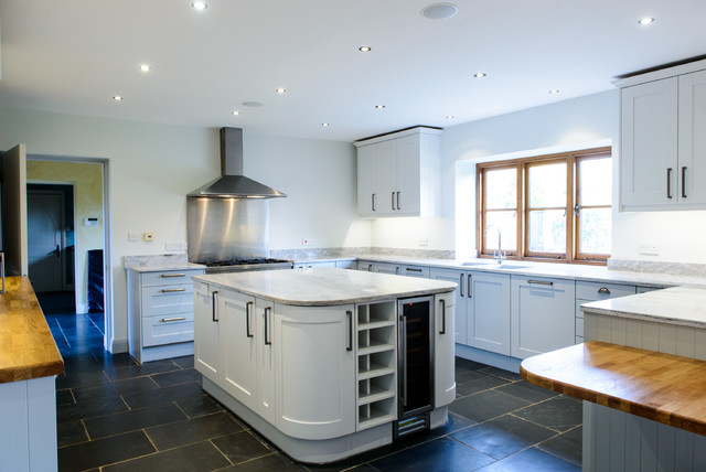 Central island is stunning feature with radiused corners - Contemporary ...