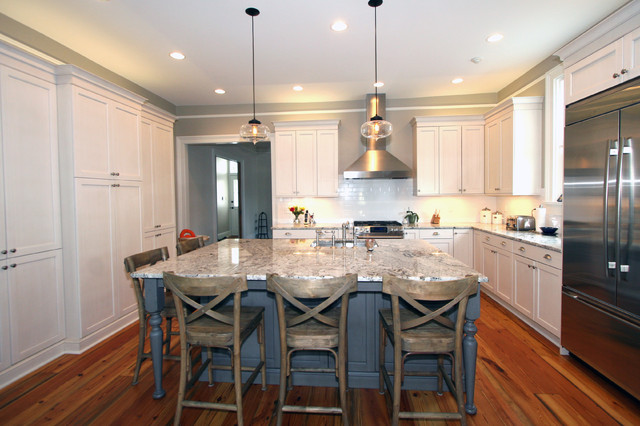 Classically Inspired Kitchen with Stainless Chimney Hood and Pantry ...