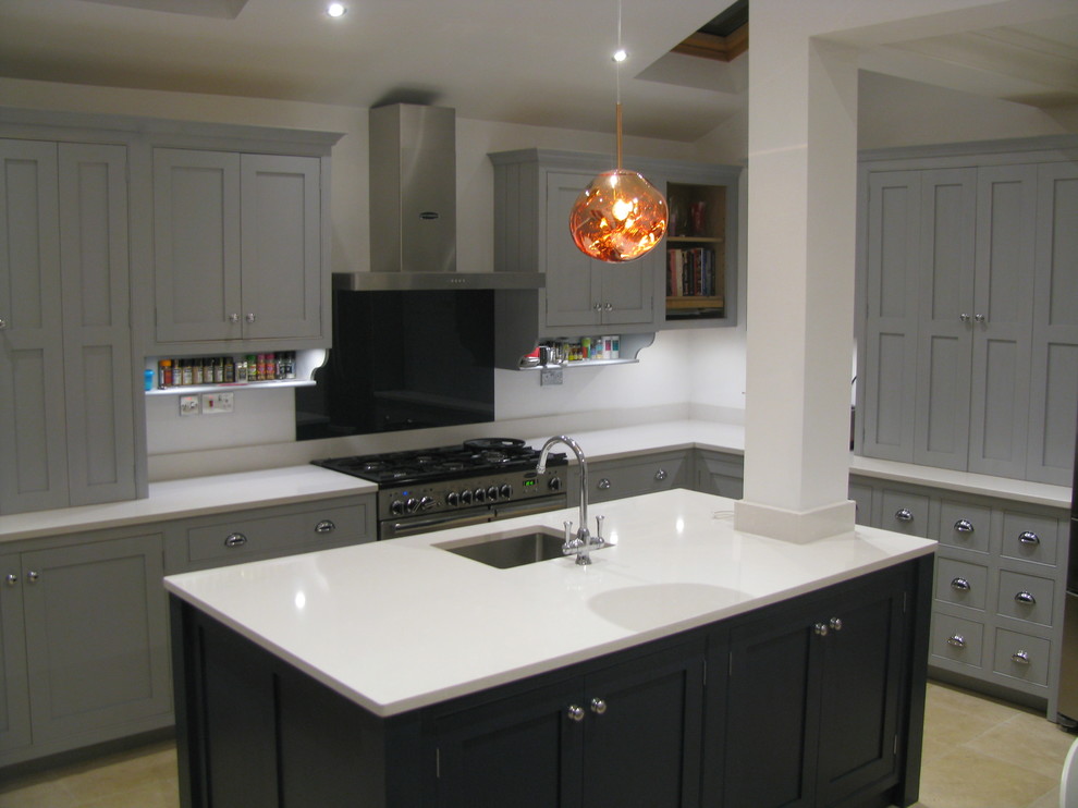 Contemporary grey and navy kitchen with central island and beaded ...
