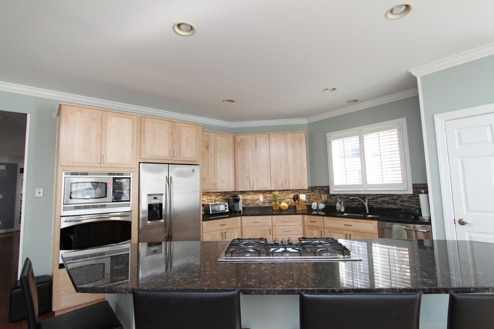 Contemporary Kitchen in Natural Maple with Black Granite Counters in ...