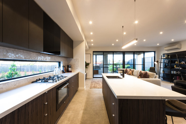 Contemporary kitchen with letterbox window and sliding doors - Modern ...