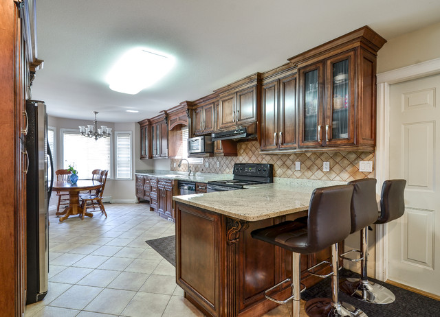 Contemporary kitchen with recessed-panel cabinets Vancouver ...