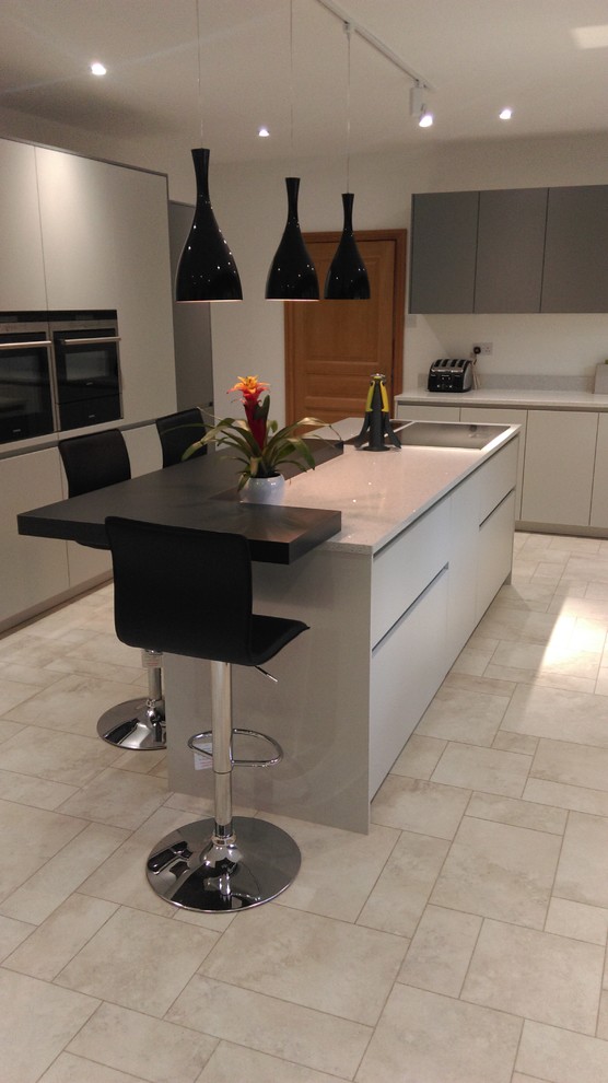 Contemporary, matt grey kitchen with island & breakfast bar ...