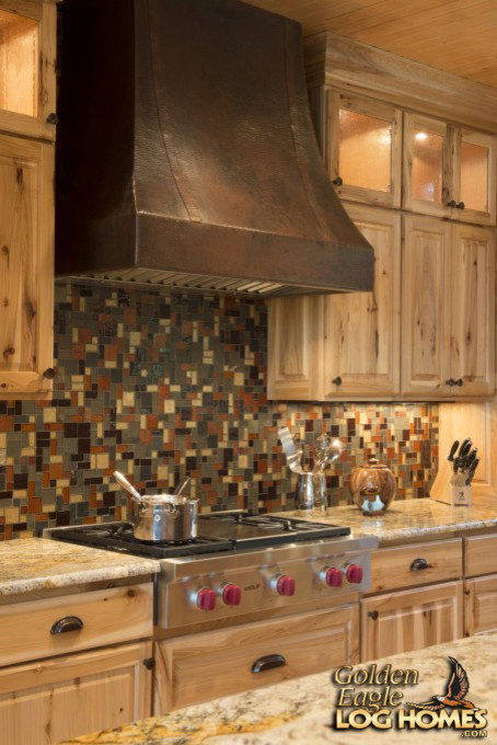 Copper range hood in a rustic kitchen Golden Eagle Log and Timber Homes ...