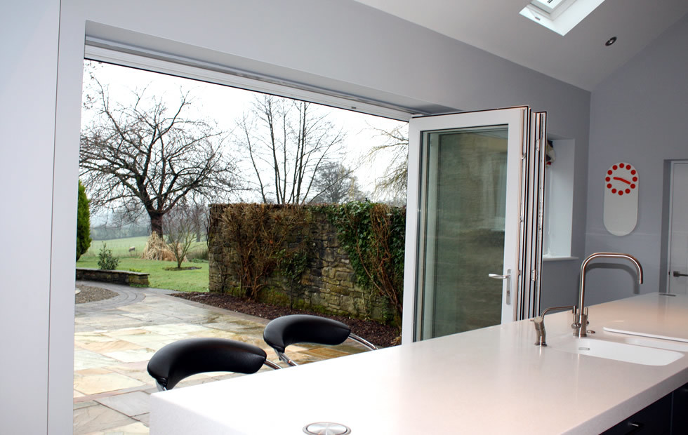 Cramped kitchen converted into luxurious and practical living space ...
