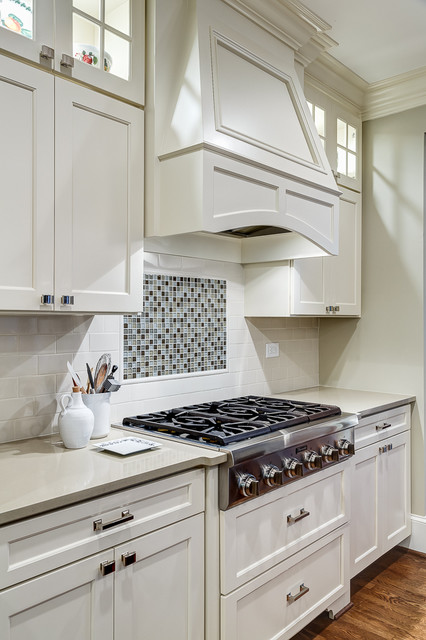 Custom hood detail blends with cabinetry - Transitional - Kitchen ...