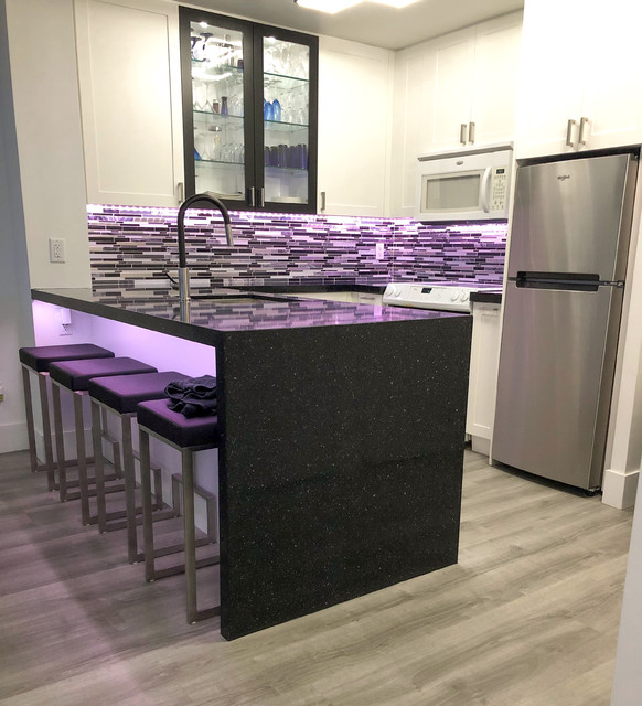 Custom shaker-style kitchen with waterfall countertop in Toronto ...