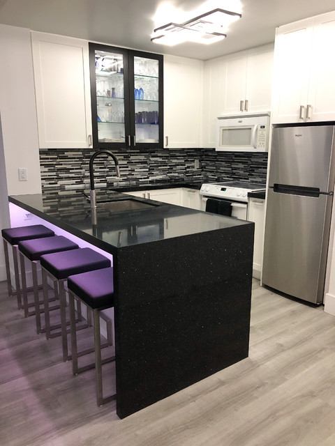 Custom shaker-style kitchen with waterfall countertop in Toronto ...