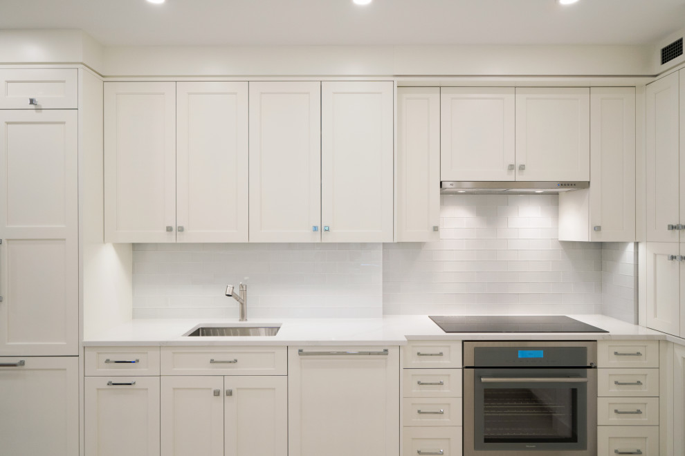 Custom White Kitchen with Pocket door access to Family room ...