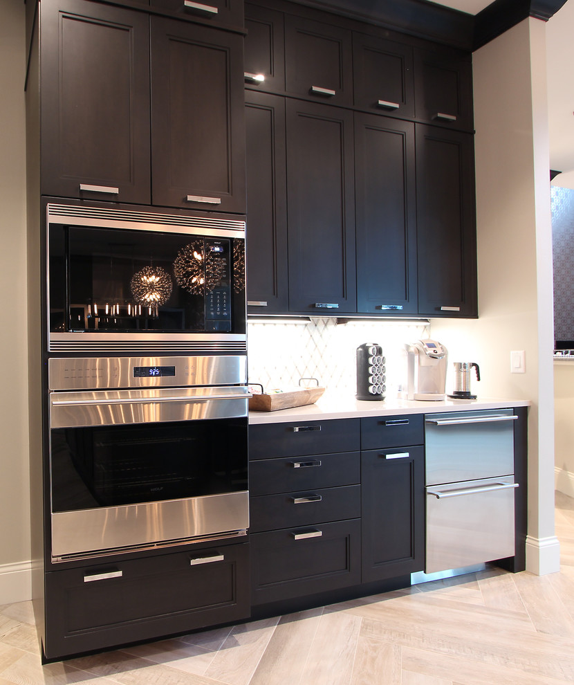 Dark Stained Cabinets in Kitchen with Herringbone Wood Floors ...