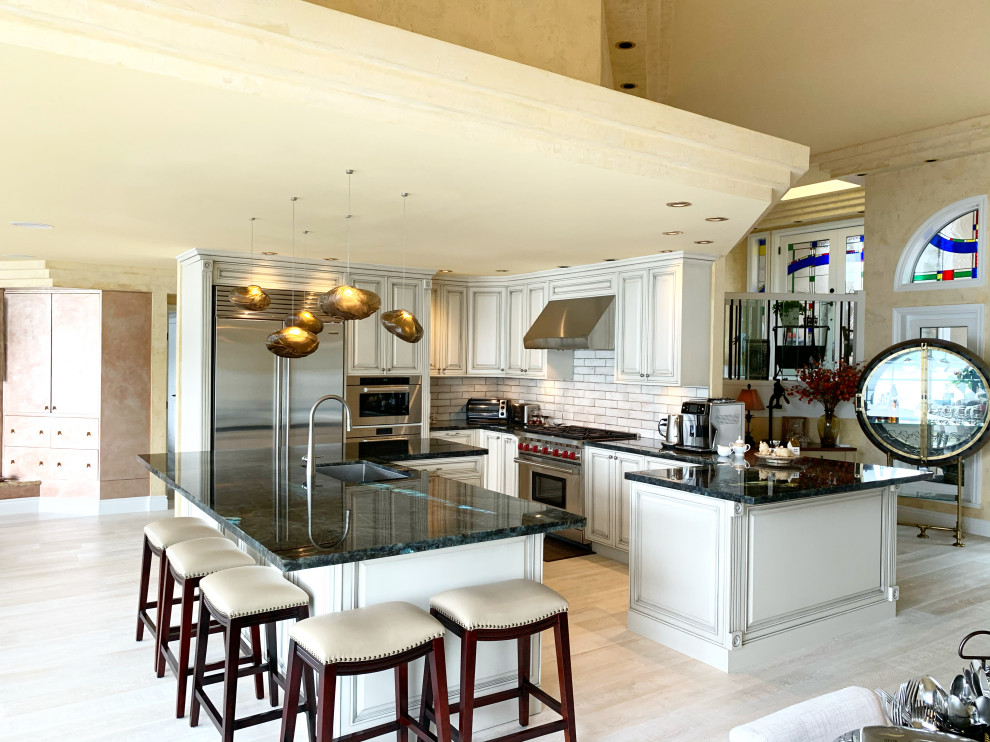 Elegant Antique White Cabinets with Natural Stone Countertop ...