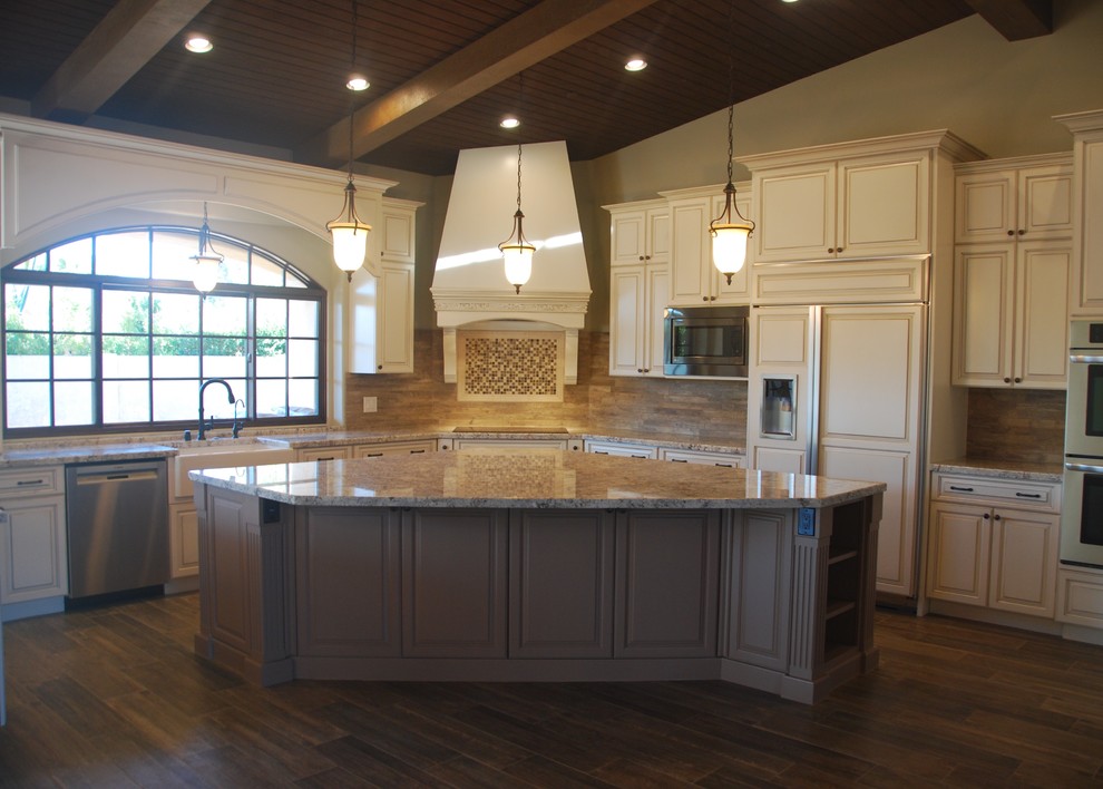 Expansive Santa Barbara Style Two Toned Kitchen with Island ...