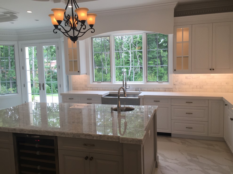 Expansive White Kitchen with Wrought Iron Detailing - Transitional ...