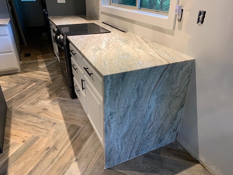 Fantasy Brown aka Terra Bianca quartzite. Waterfall end panel ...