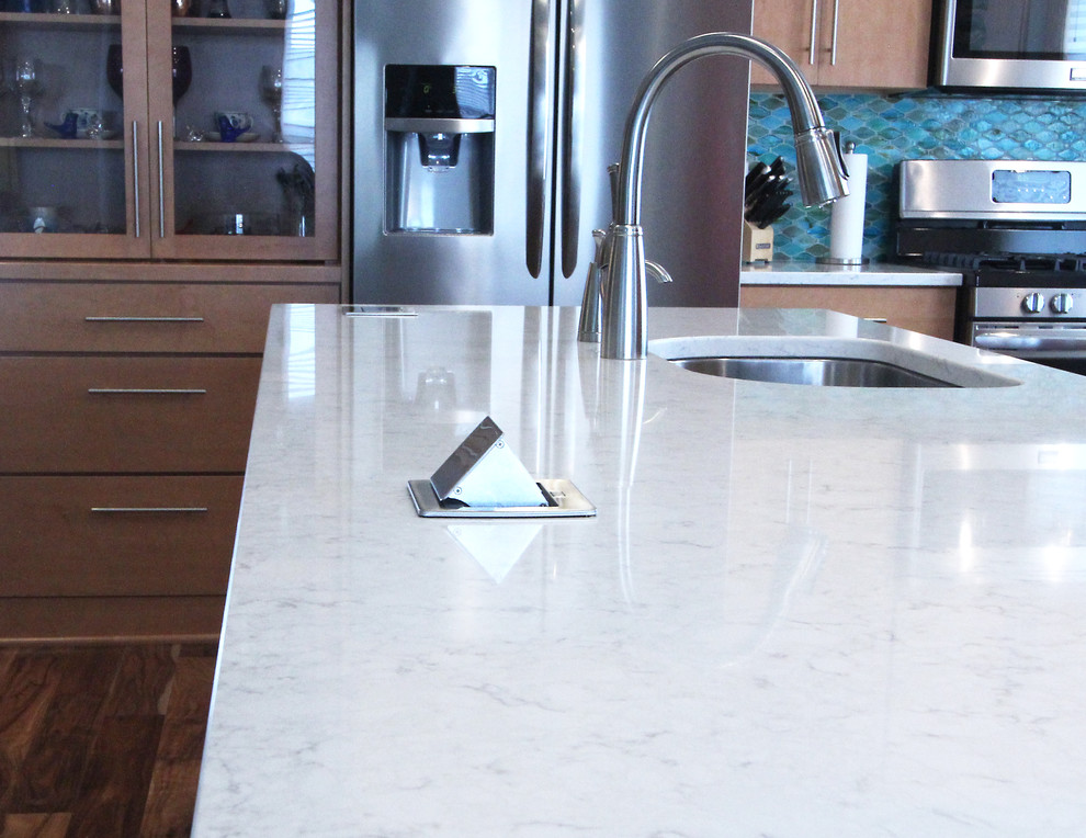 Flat Natural Maple Cabinets in Open Kitchen with Glass Backsplash ...