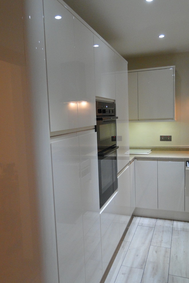 Gloss Ivory Handleless Kitchen in Hinxworth, Herts - Contemporary ...