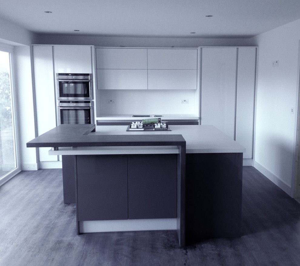 Handleless kitchen with acrylic worktops - Modern - Kitchen - Dorset ...