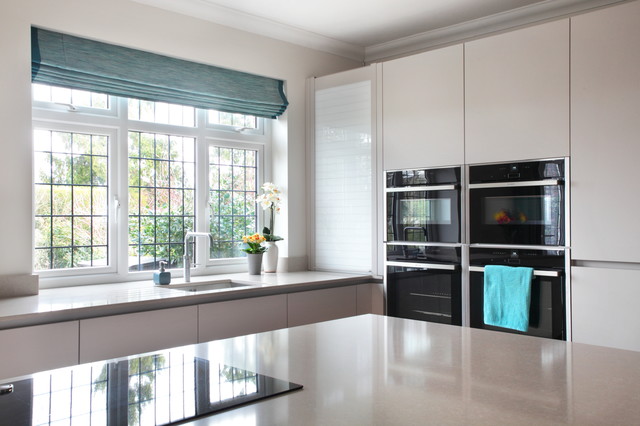 Handleless matt cashmere kitchen with tambour unit - Contemporary ...