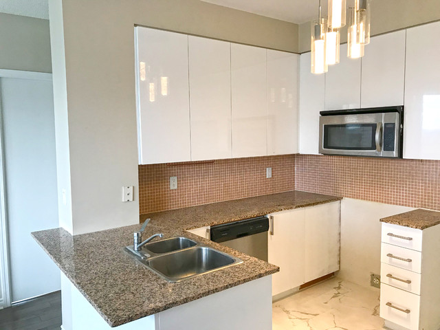 High-gloss custom kitchen cabinet refacing in Toronto - Modern ...