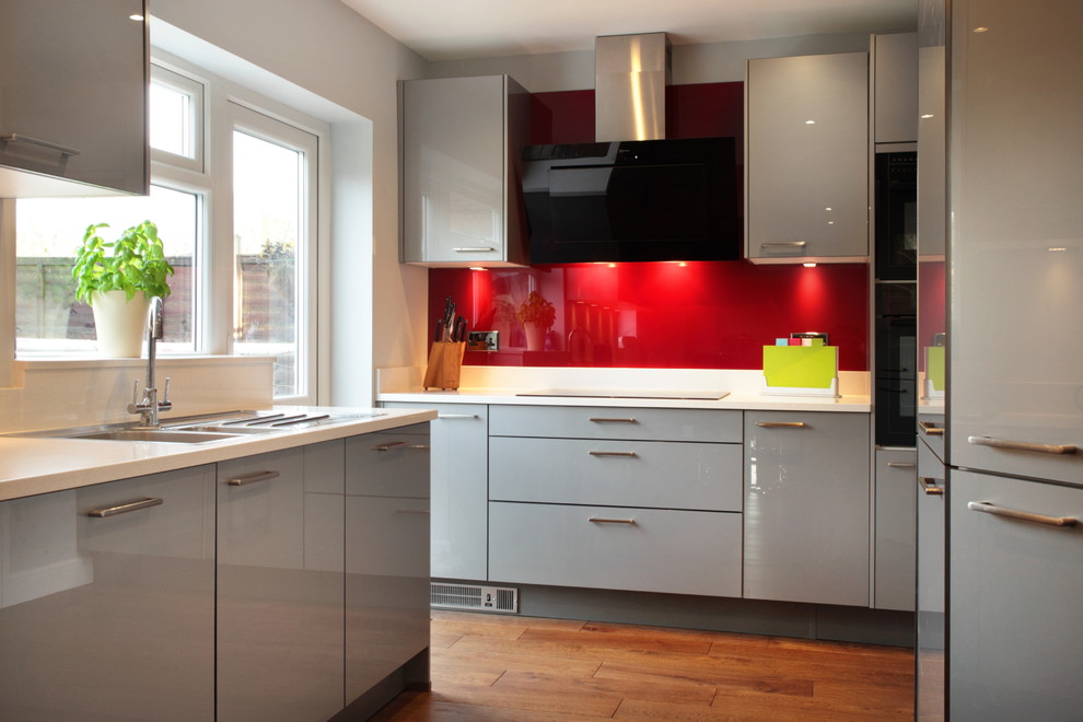 High gloss grey kitchen with red splashback - Contemporary - Kitchen ...