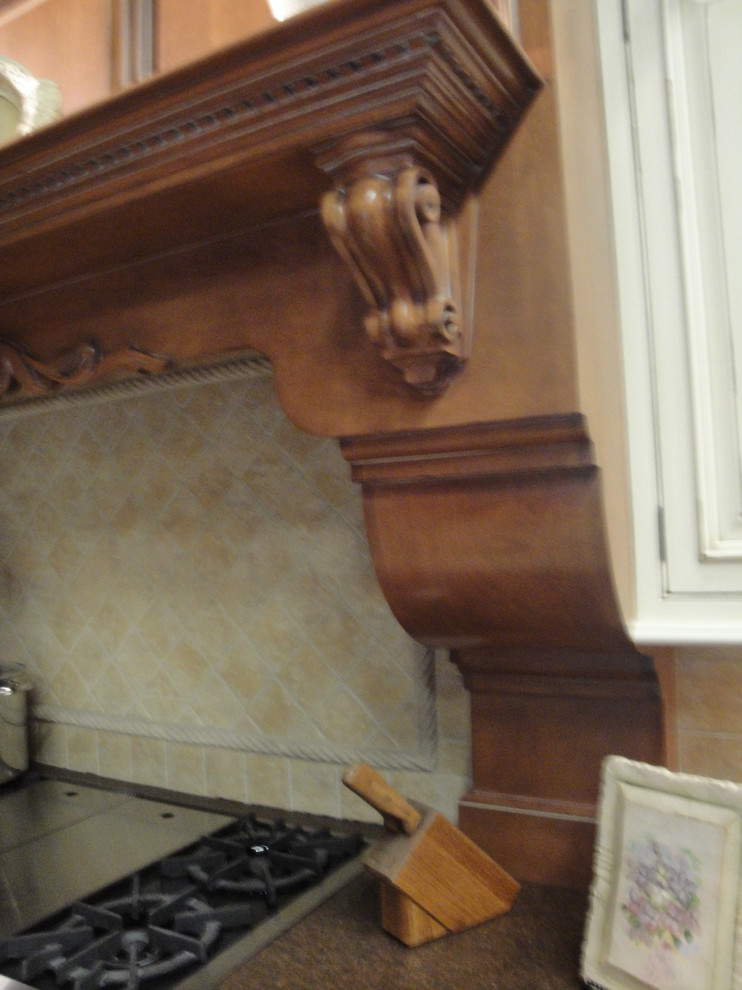 hood with corbels - Farmhouse - Kitchen - Orange County - by The ...
