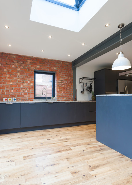 Industrial Kitchen With Exposed Brick & Stainless Steel Features ...