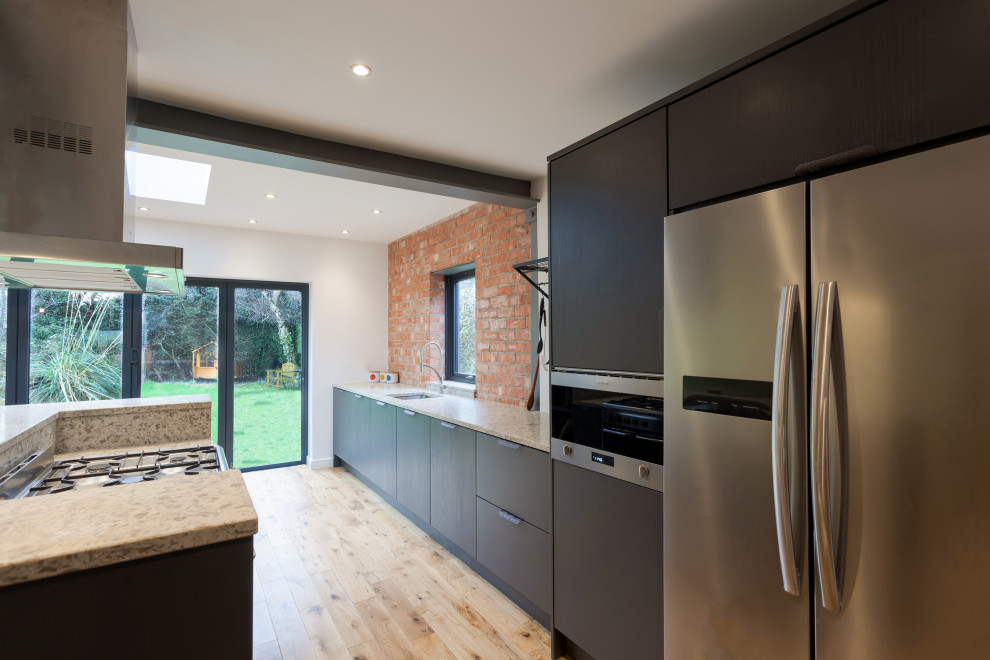 Industrial Kitchen With Exposed Brick & Stainless Steel Features ...
