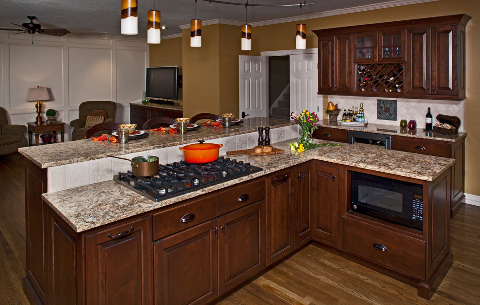 Island cooktop has downdraft ventilation allowing for a more open view ...