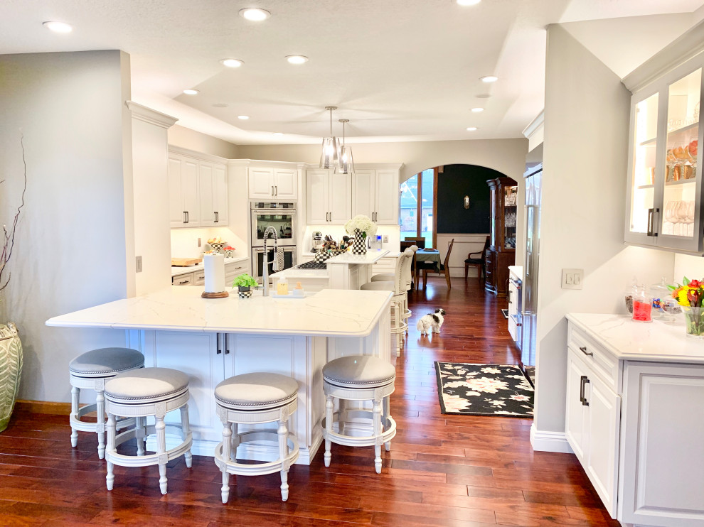 Ivory White Kitchen With Marble Look Quartz Counters and Splash ...