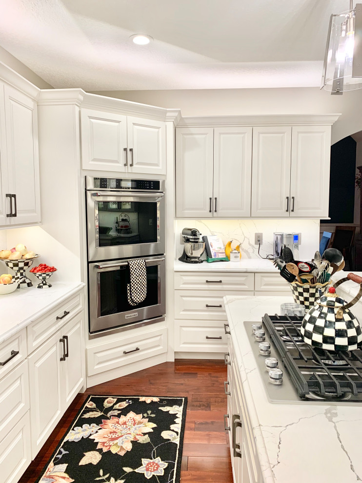 Ivory White Kitchen With Marble Look Quartz Counters and Splash ...