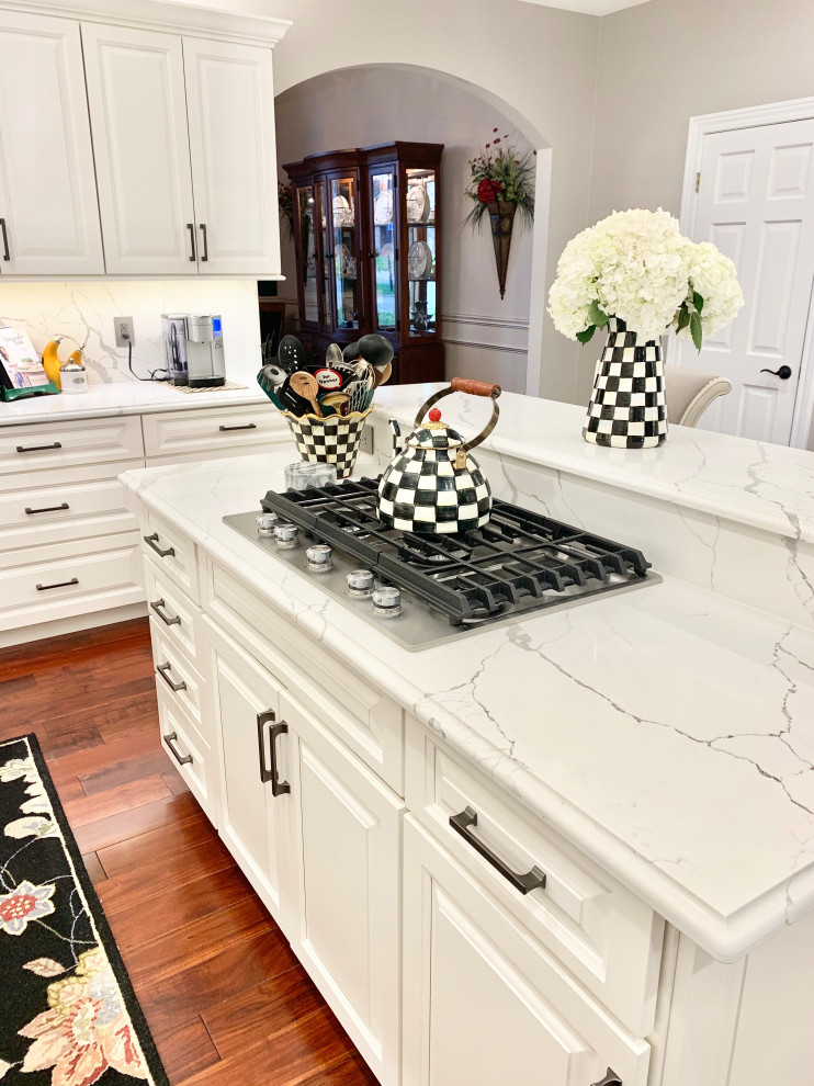 Ivory White Kitchen With Marble Look Quartz Counters and Splash ...