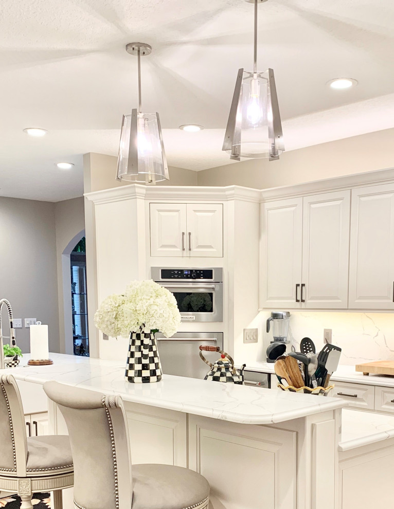 Ivory White Kitchen With Marble Look Quartz Counters and Splash ...
