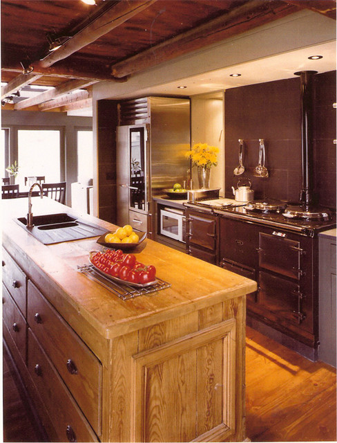 Kitchen cook wall w/AGA and prep island made from antique british shop ...