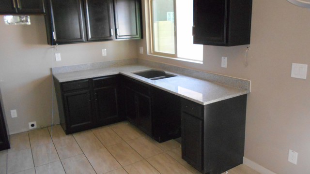 Kitchen Perimeter with Pebble Beach Granite Countertops - Kitchen ...