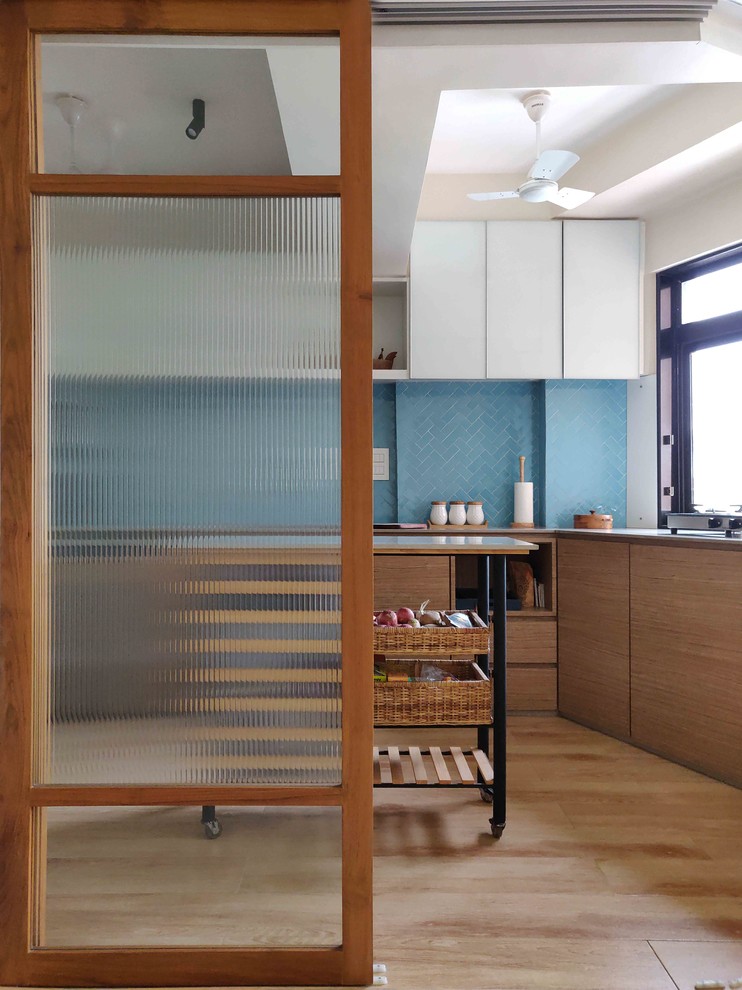 Kitchen with Sliding Doors - Modern - Kitchen - Mumbai - by STaND ...