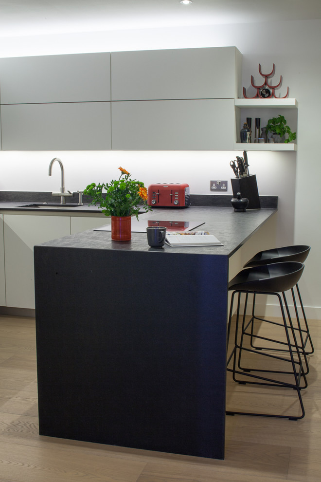 Kitchen with Waterfall Worktop - Contemporary - Kitchen - London - by ...