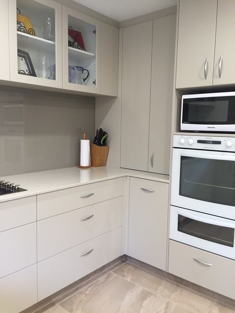 Large u-shaped kitchen with Eurostone Beige benchtops - Contemporary ...