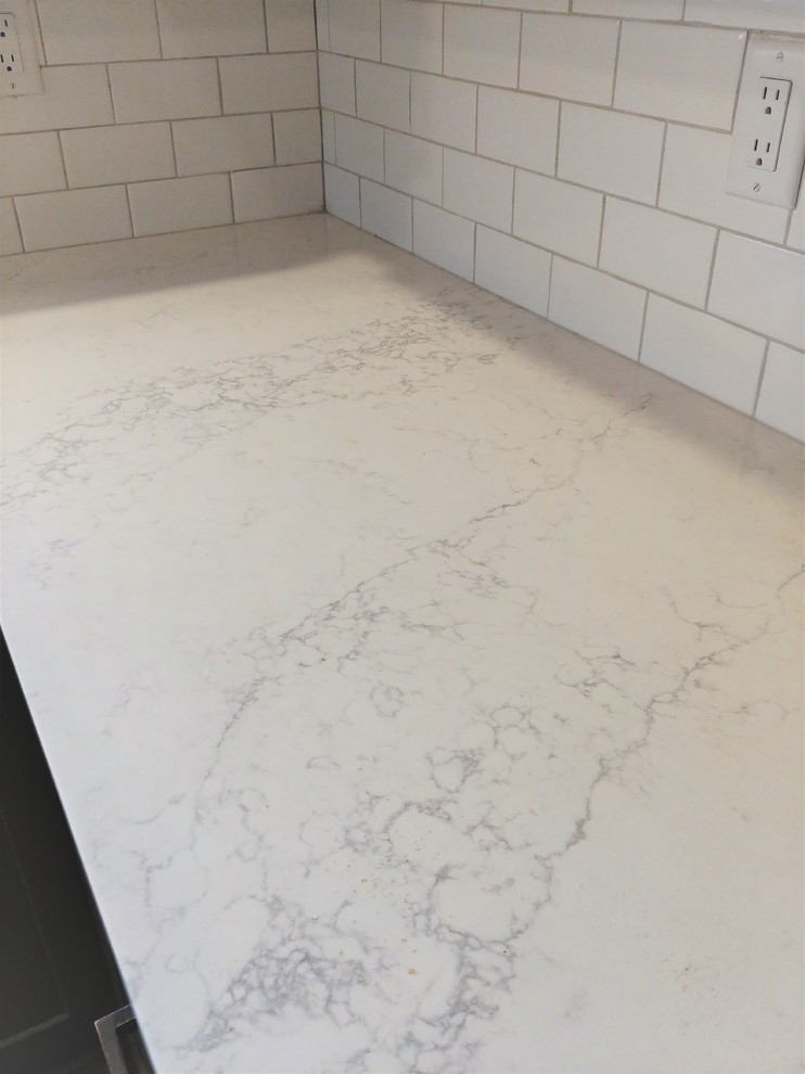 LG Viatera countertops in Muse, Rittenhouse Square subway tiles by Dal ...