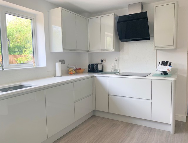 Light grey handleless kitchen for retired couple - Contemporary ...