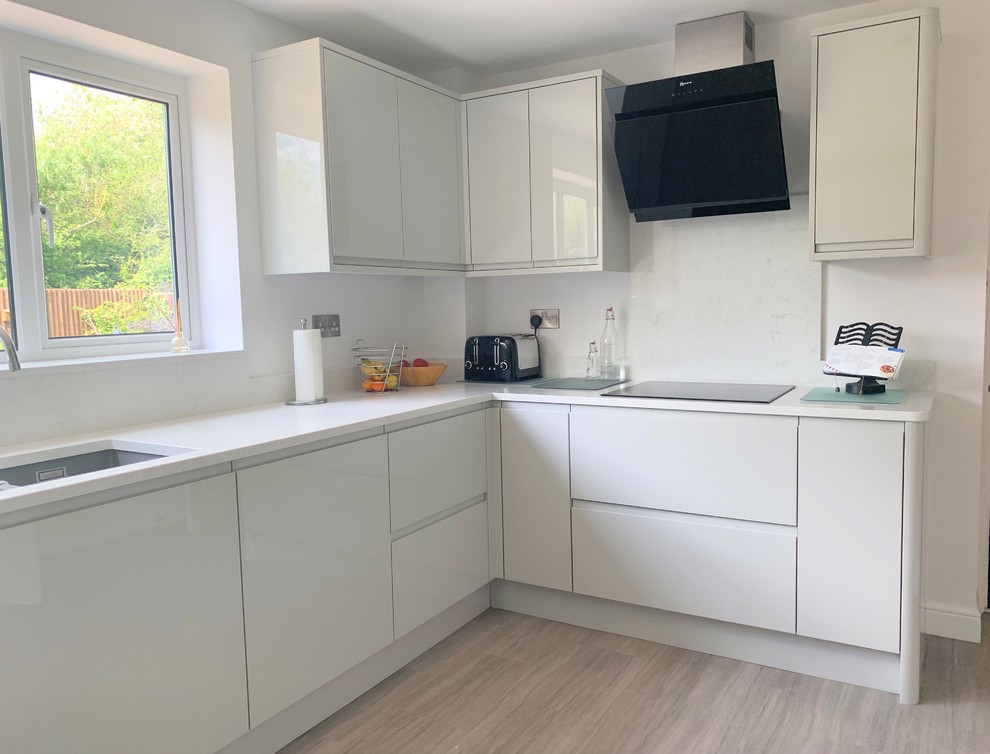 Light grey handleless kitchen for retired couple - Contemporary ...