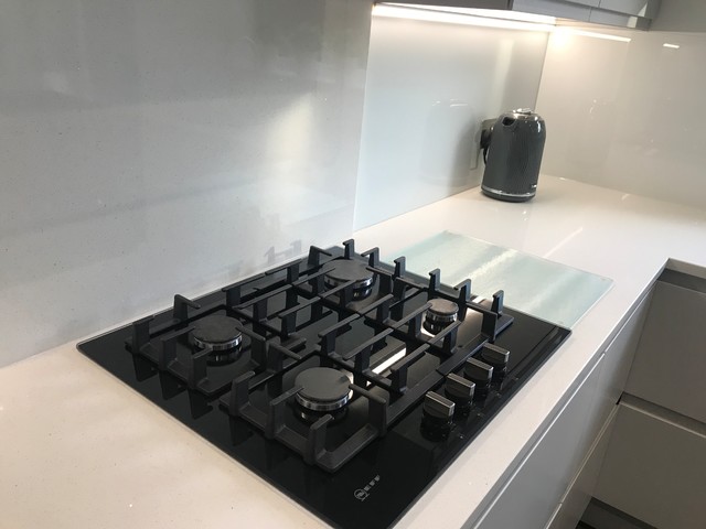 Light grey matt handleless kitchen with quartz worktop - Contemporary ...