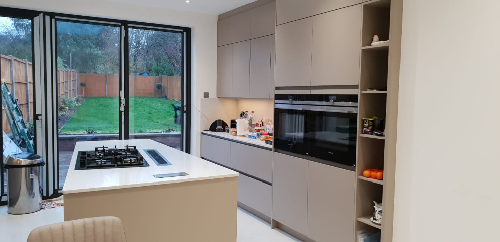 Matt Stone Grey Handleless kitchen in an open plan design in north ...
