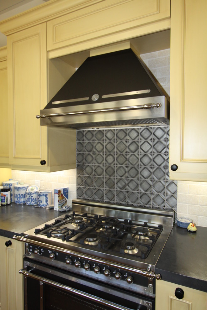 Metal tiles at kitchen backsplash - Traditional - Kitchen - Charlotte ...