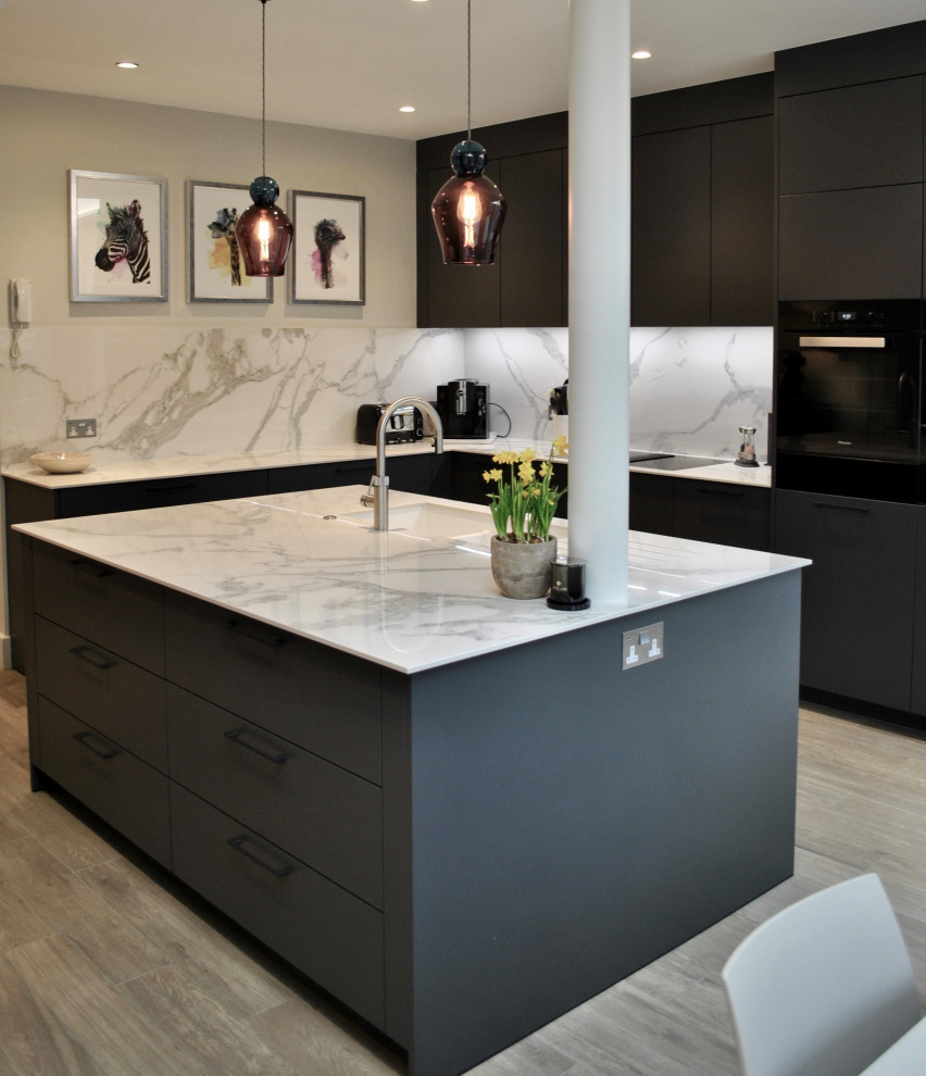 Modern and an elegant kitchen in dark grey with stunning worktop ...