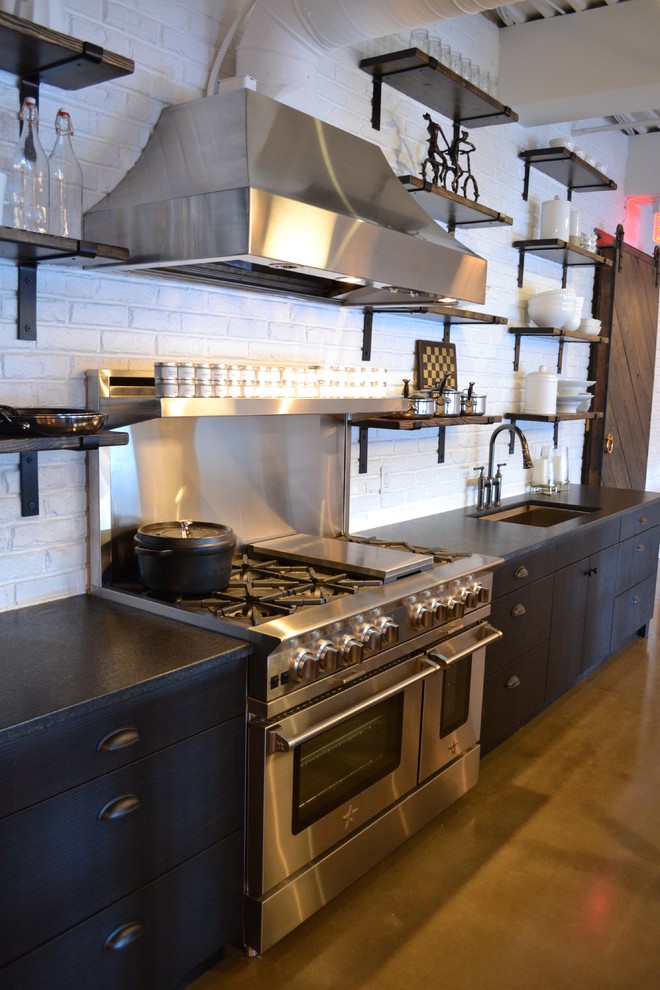 Modern Industrial Kitchen with Blue Cabinets and Stainless Range and ...