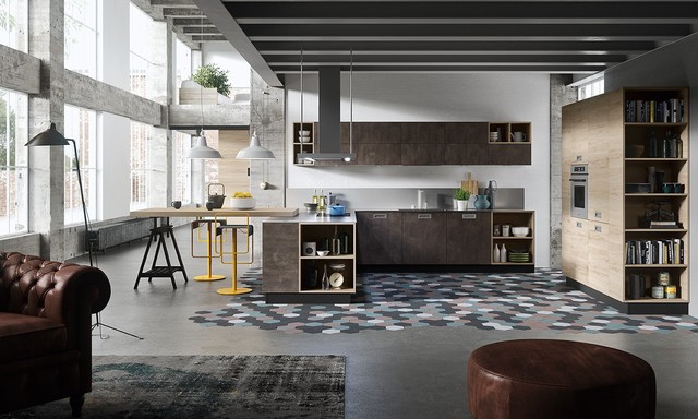 Modern industrial kitchen with light wood cabinets and stainless steel ...