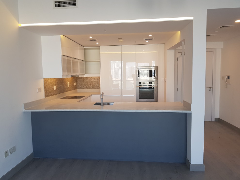 Modern kitchen with grey corian - Modern - Kitchen - Other - by reDécor ...