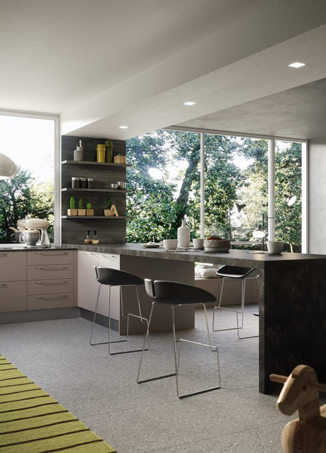 Modern kitchen with light beige cabinets and dark brown shelves ...