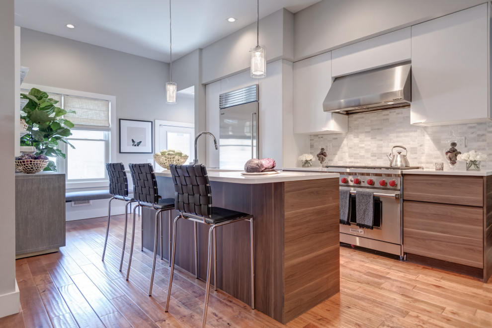 Modern kitchen with wood cabinet finishes - Contemporary - Kitchen ...