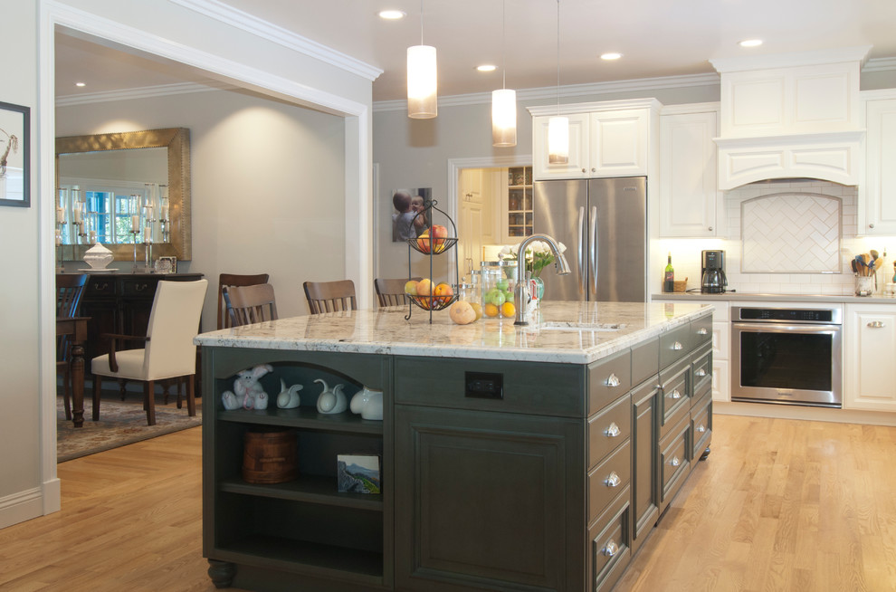 Moving from kitchen to formal dining is an easy free flow ...